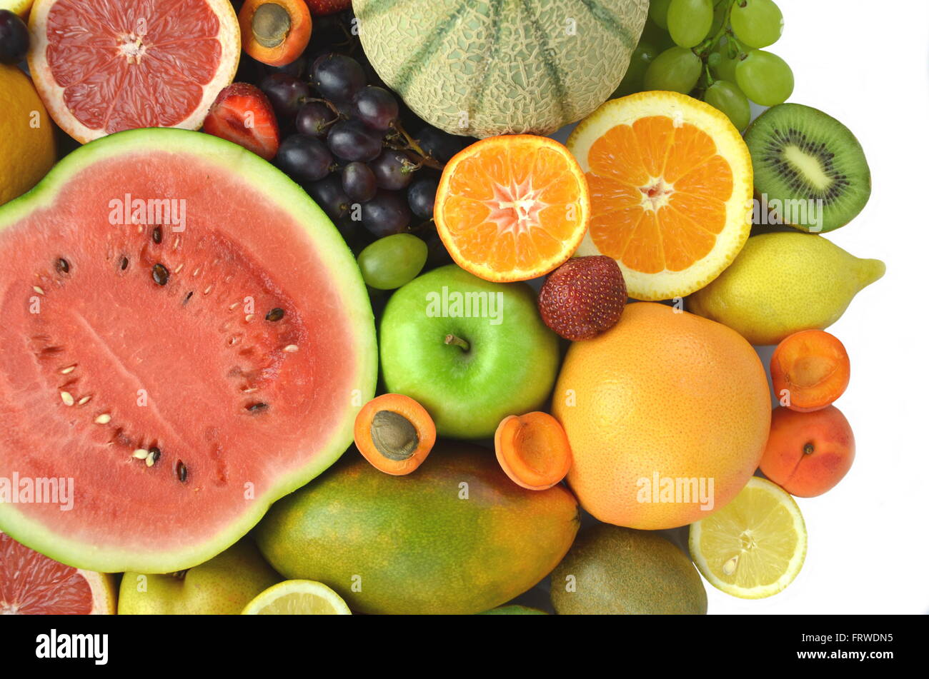 Variety of fresh and delicious fruits isolated on white Stock Photo - Alamy