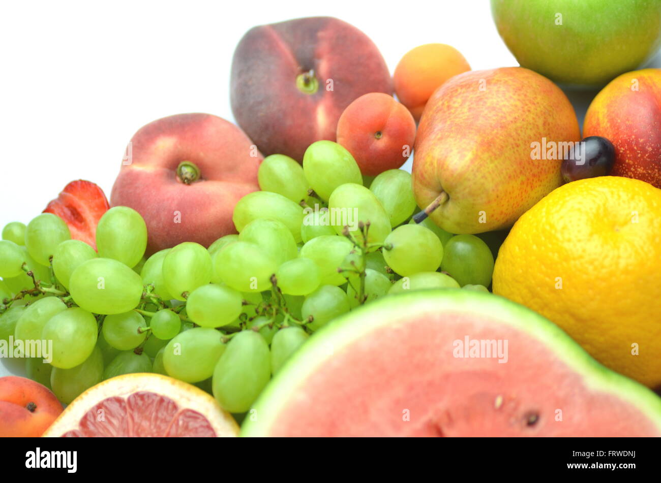Variety of fresh and delicious fruits isolated on white Stock Photo - Alamy