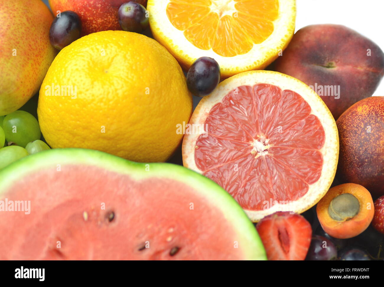 Variety of fresh and delicious fruits isolated on white Stock Photo - Alamy