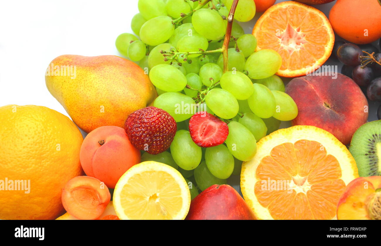 Variety of fresh and delicious fruits isolated on white Stock Photo - Alamy