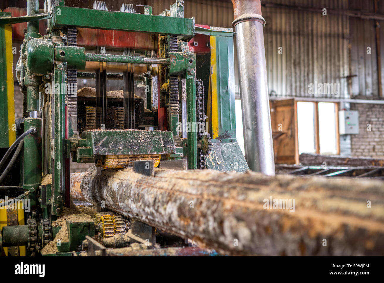 Image of sawing machine during operation Stock Photo - Alamy