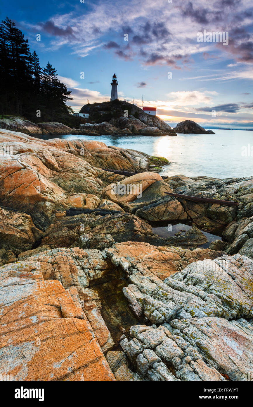 Sunrise behind Point Atkinson Lighthouse, in West Vancouver, British ...