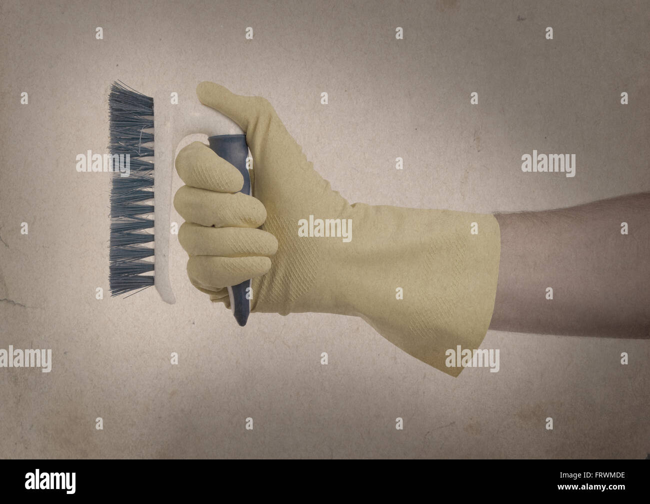 Cleaning brush in hand isolated on white - Vintage Stock Photo - Alamy