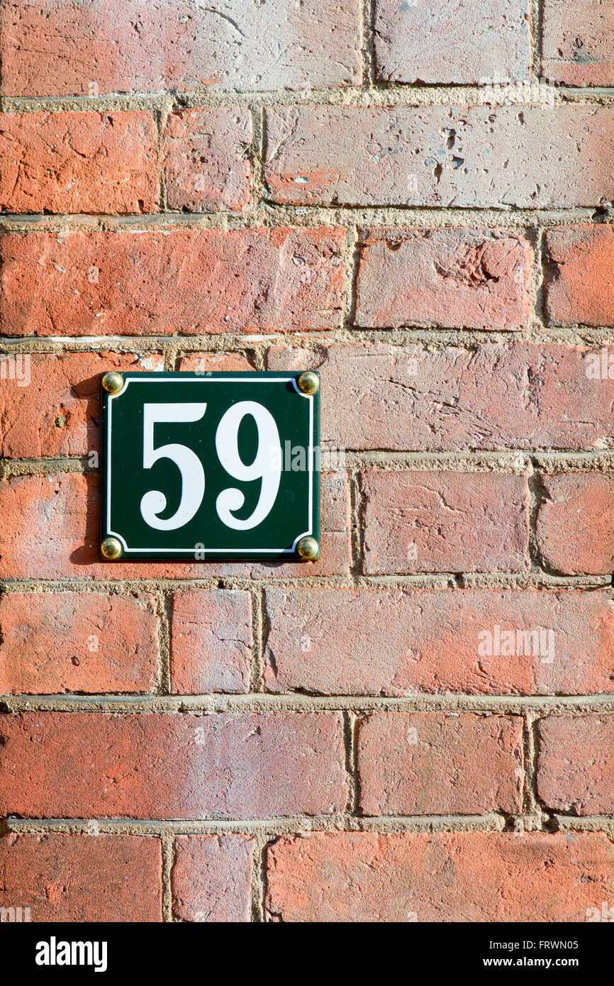 House Number 59 sign on wall Stock Photo - Alamy