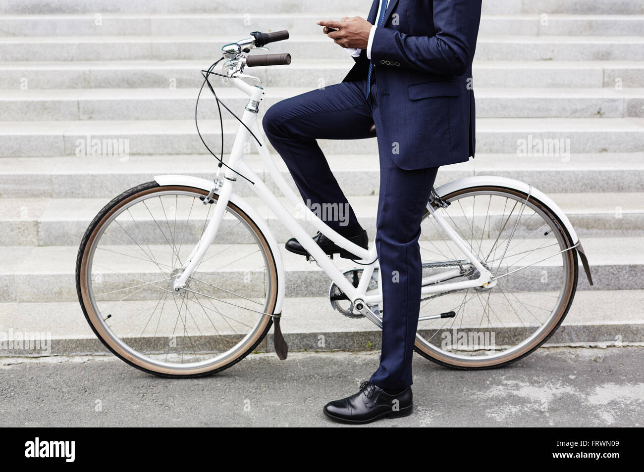 Riding to work on bicycle Stock Photo - Alamy