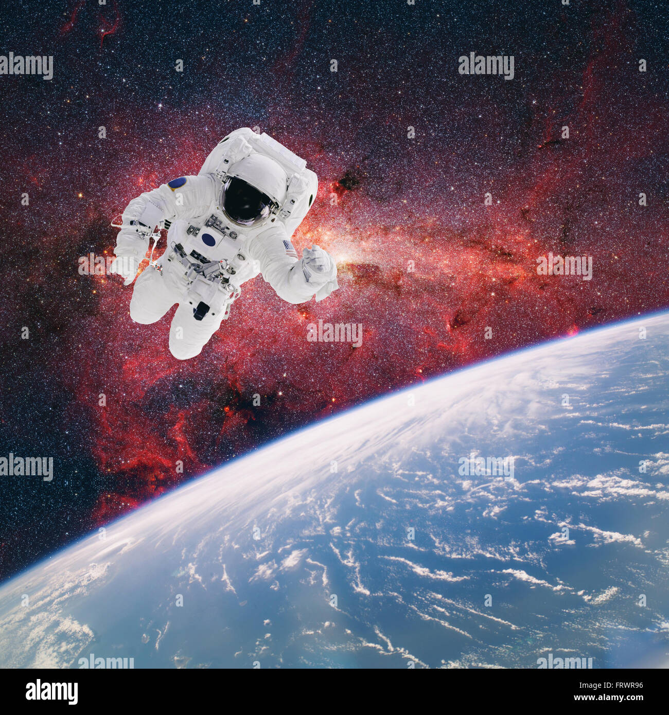 Astronaut in outer space with planet earth as backdrop. Elements of ...