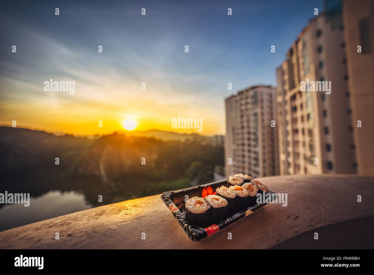 Sushi sunrise - eating breakfast in a modern building surrounded by ...