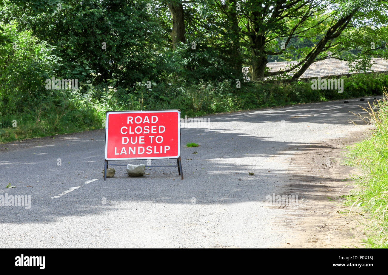 A sign on a closed road saying 'road closed due to landslip' Stock ...
