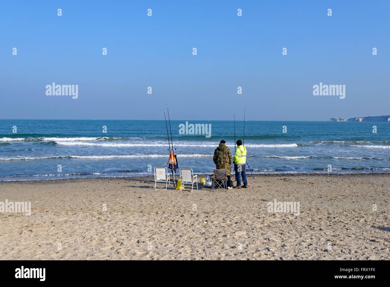 Fishing off beach hi-res stock photography and images - Alamy