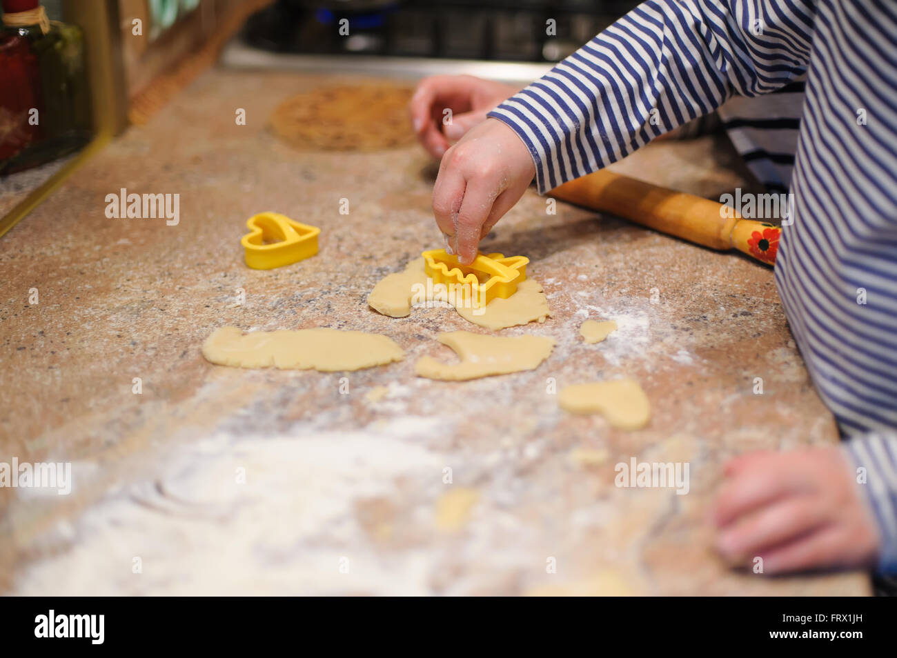 Kid making homemade cookies Stock Photo - Alamy