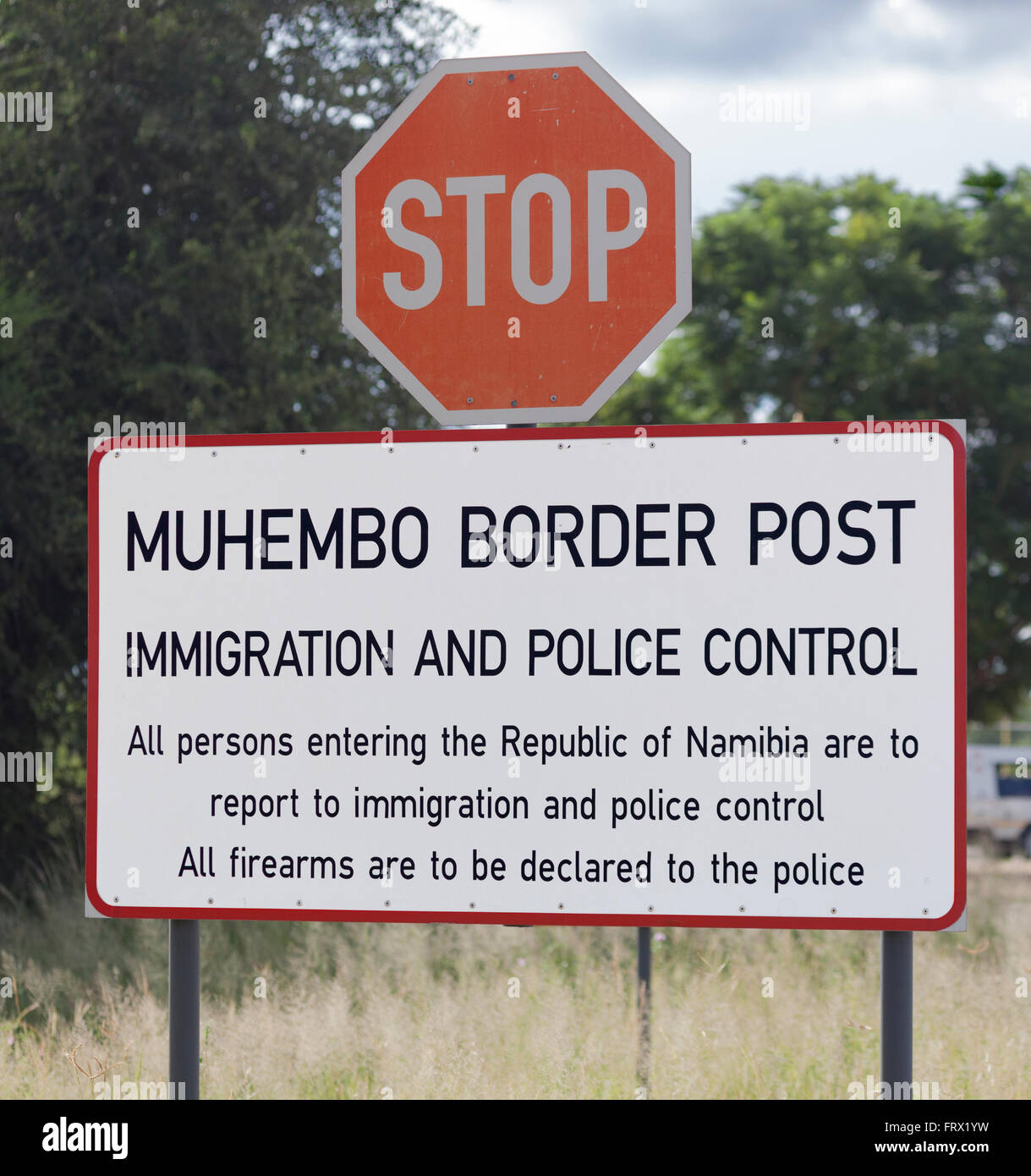 Stop sign for immigration & police control at the Muhembo border post ...