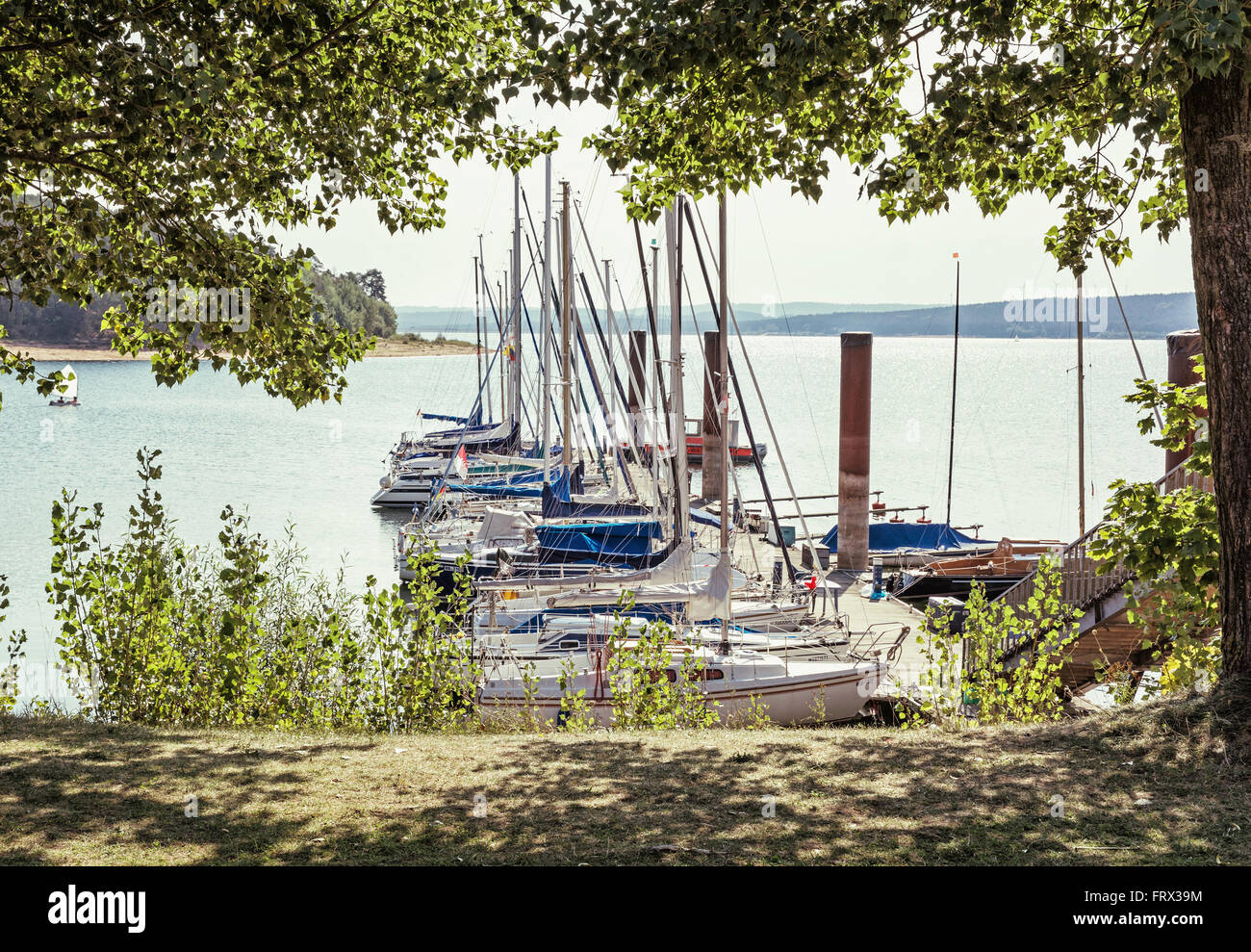 Sailboats at the pier in Brombachsee, Germany. Summer vacation Stock ...