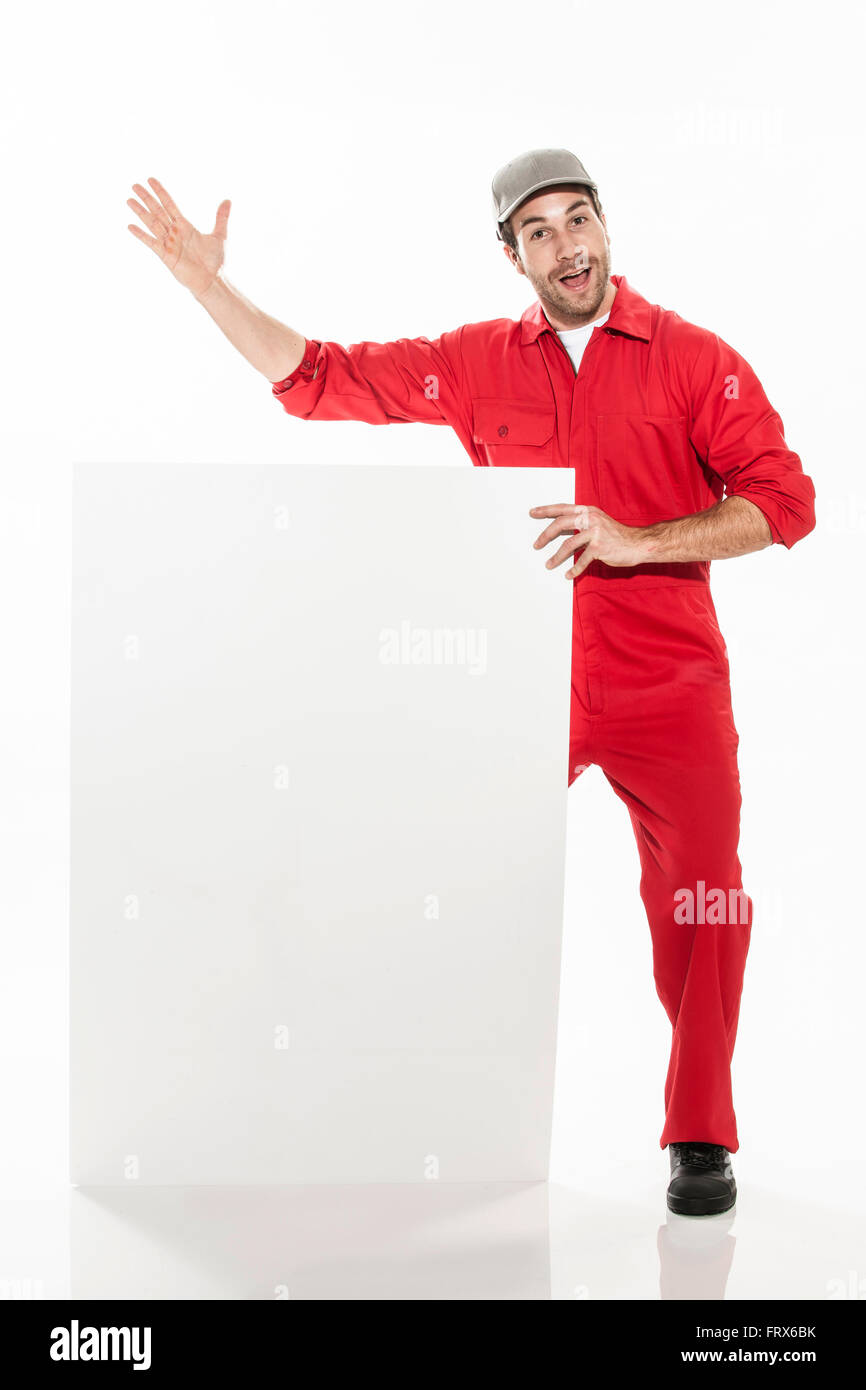 Full length portrait of a technician in a uniform doing positive ...