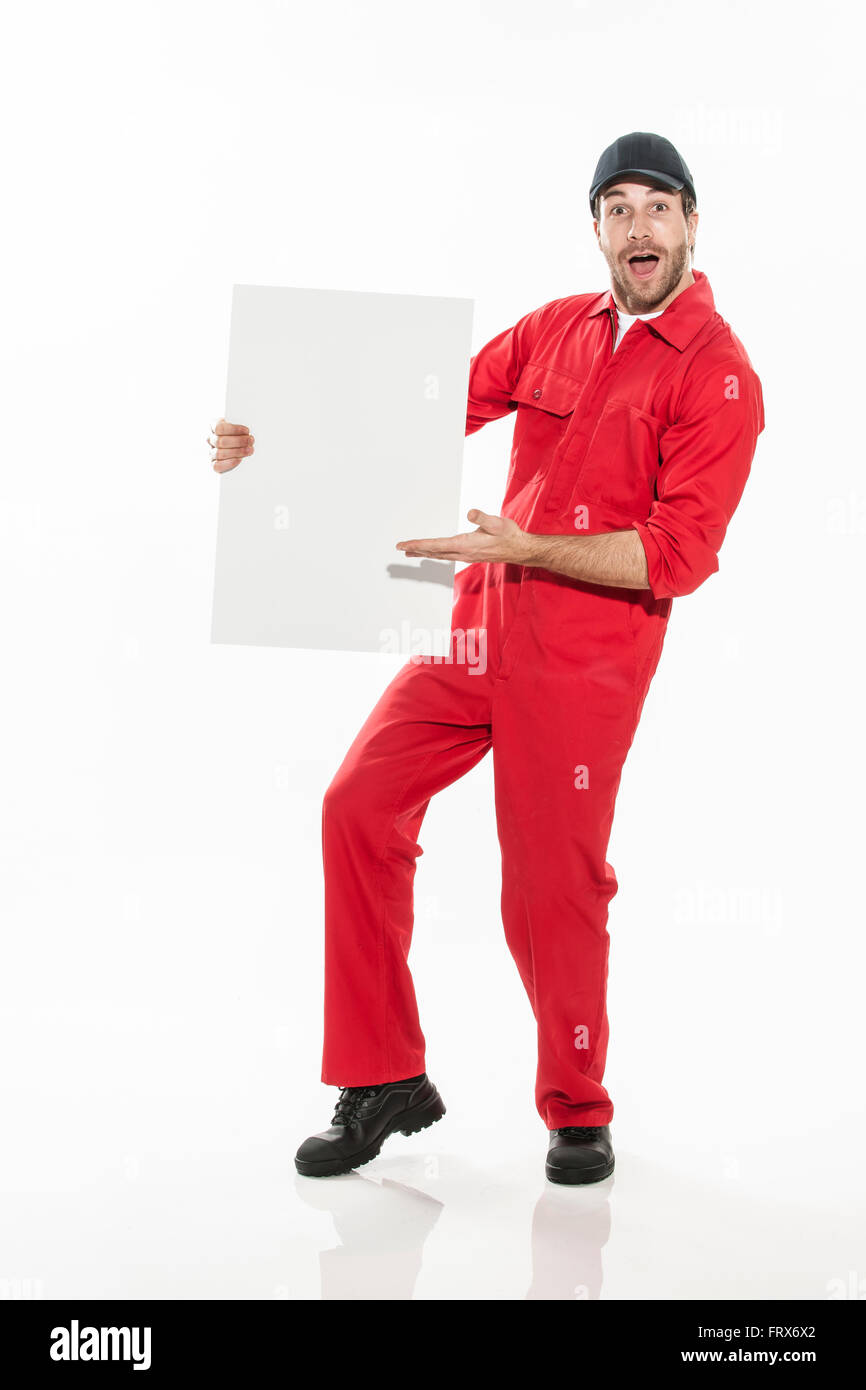 Full length portrait of a technician in a uniform doing positive ...