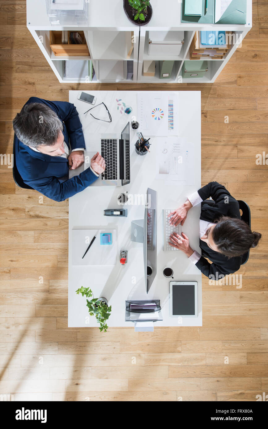 Two businesswomen with one man hi-res stock photography and images - Alamy