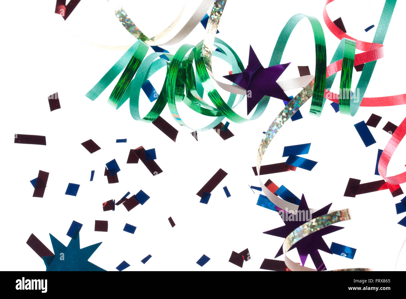 Close-up shot of colorful streamers and star shape decorations over ...