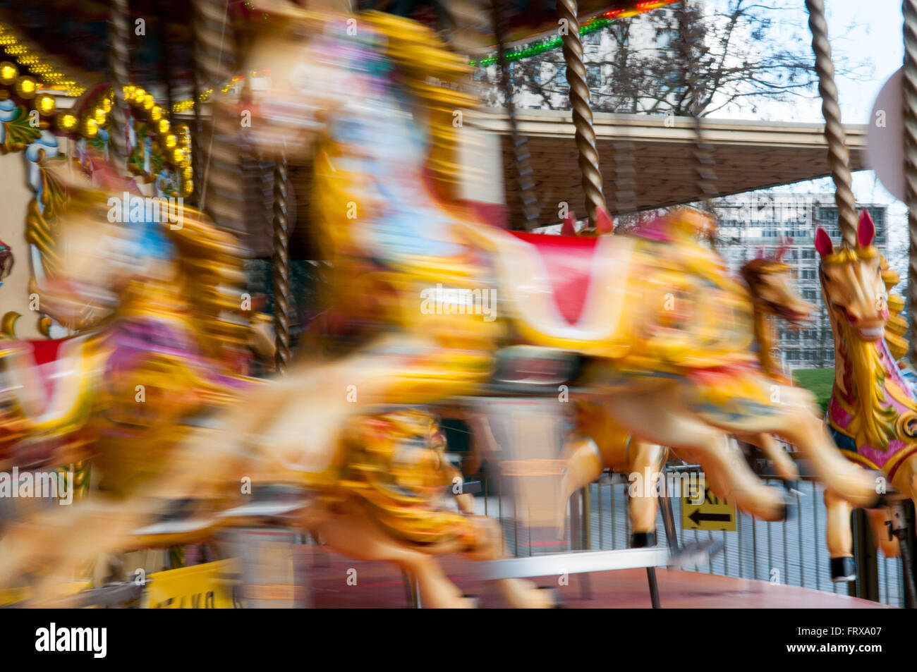 Merry go round at the the fair with motion blur Stock Photo - Alamy