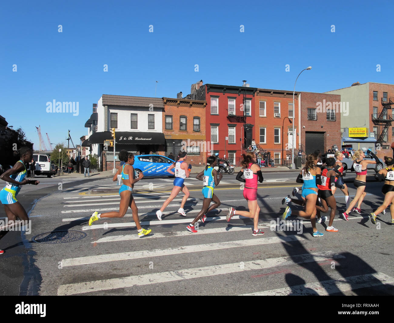 Group of runners going through Brooklyn during the New York City ...
