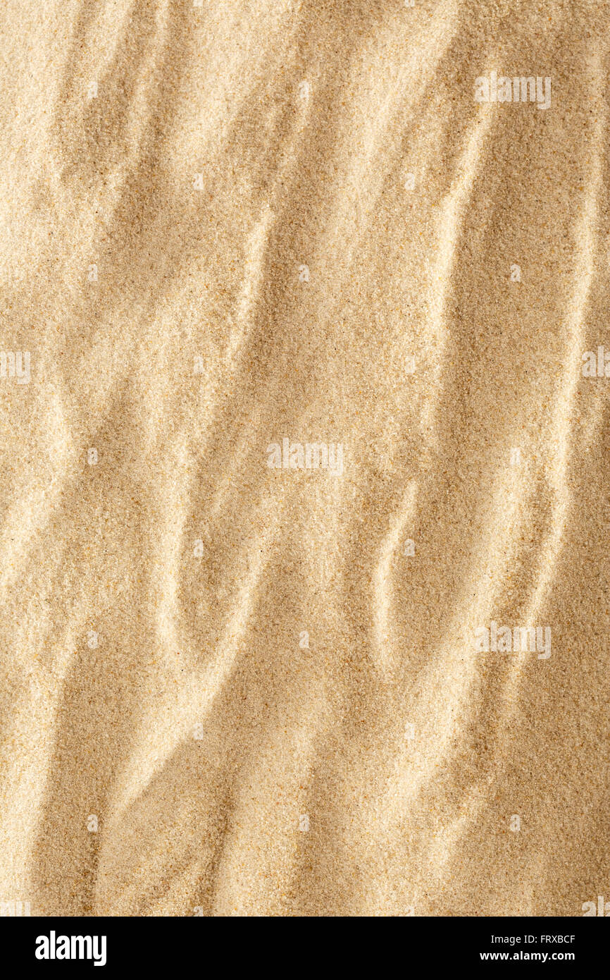 Wavy sample of beach sand as background Stock Photo - Alamy