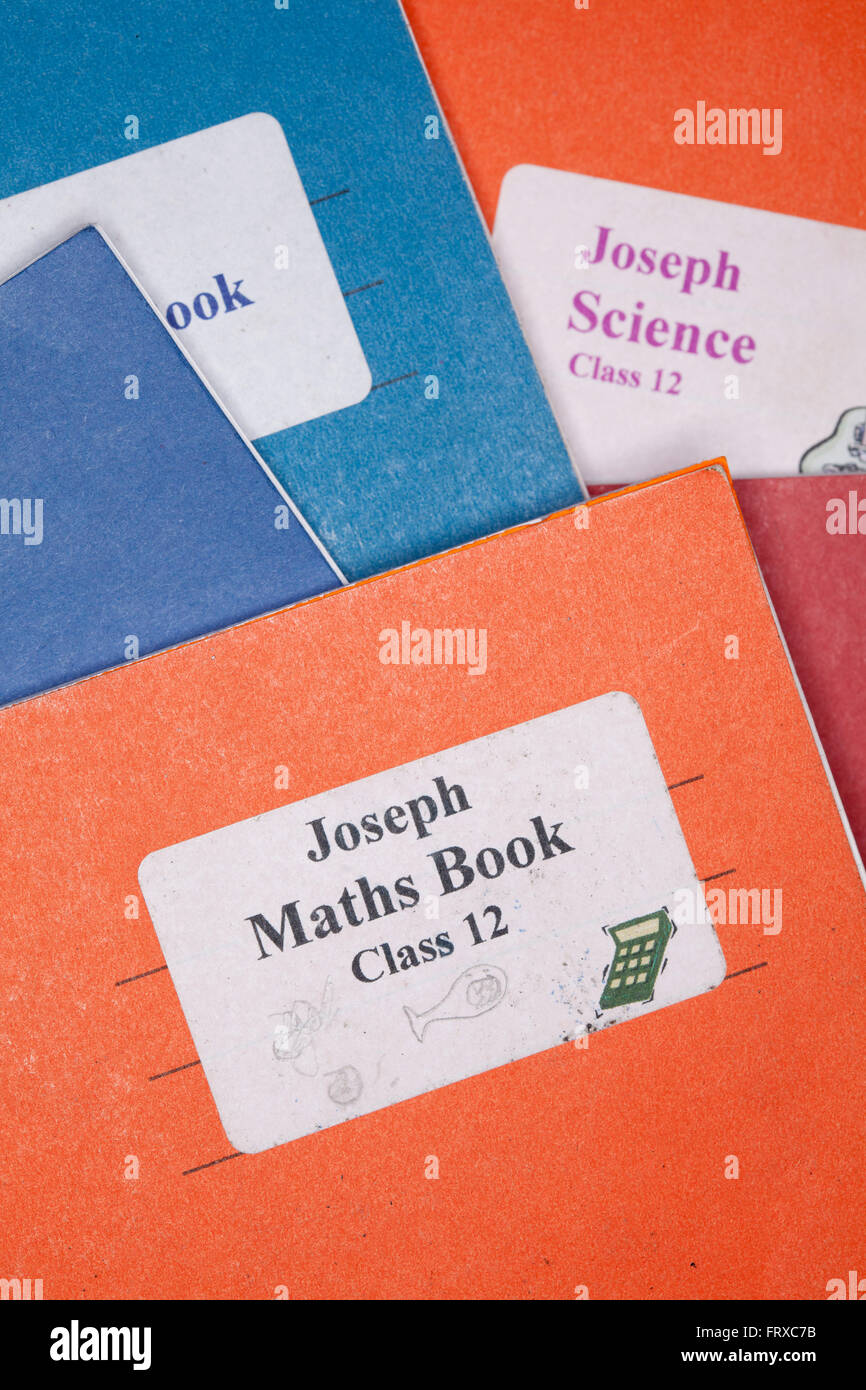 A collection of childrens school work books with the name Joe on the a ...