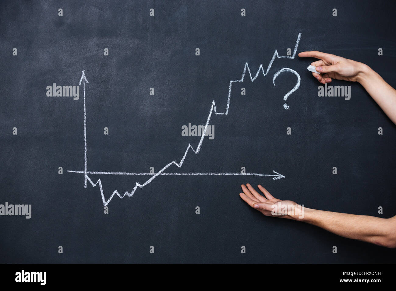 Decreasing and increasing graph showing uncertainty drawn on blackboard ...