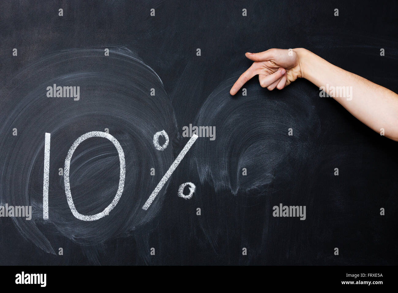Hand pointing on ten percent drawn on blackboard with chalk Stock Photo ...