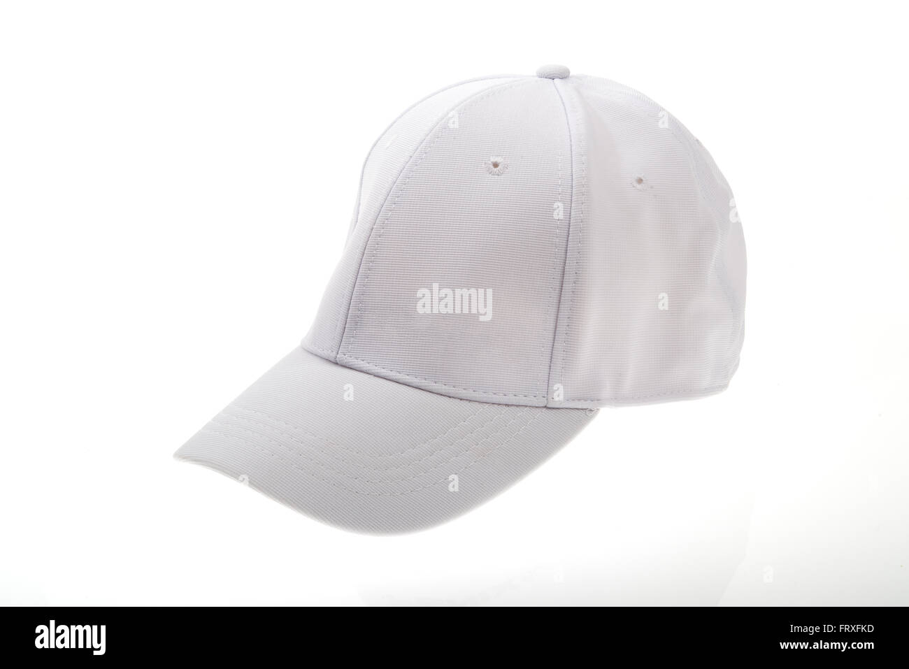 Adult white golf cap on white background Stock Photo - Alamy
