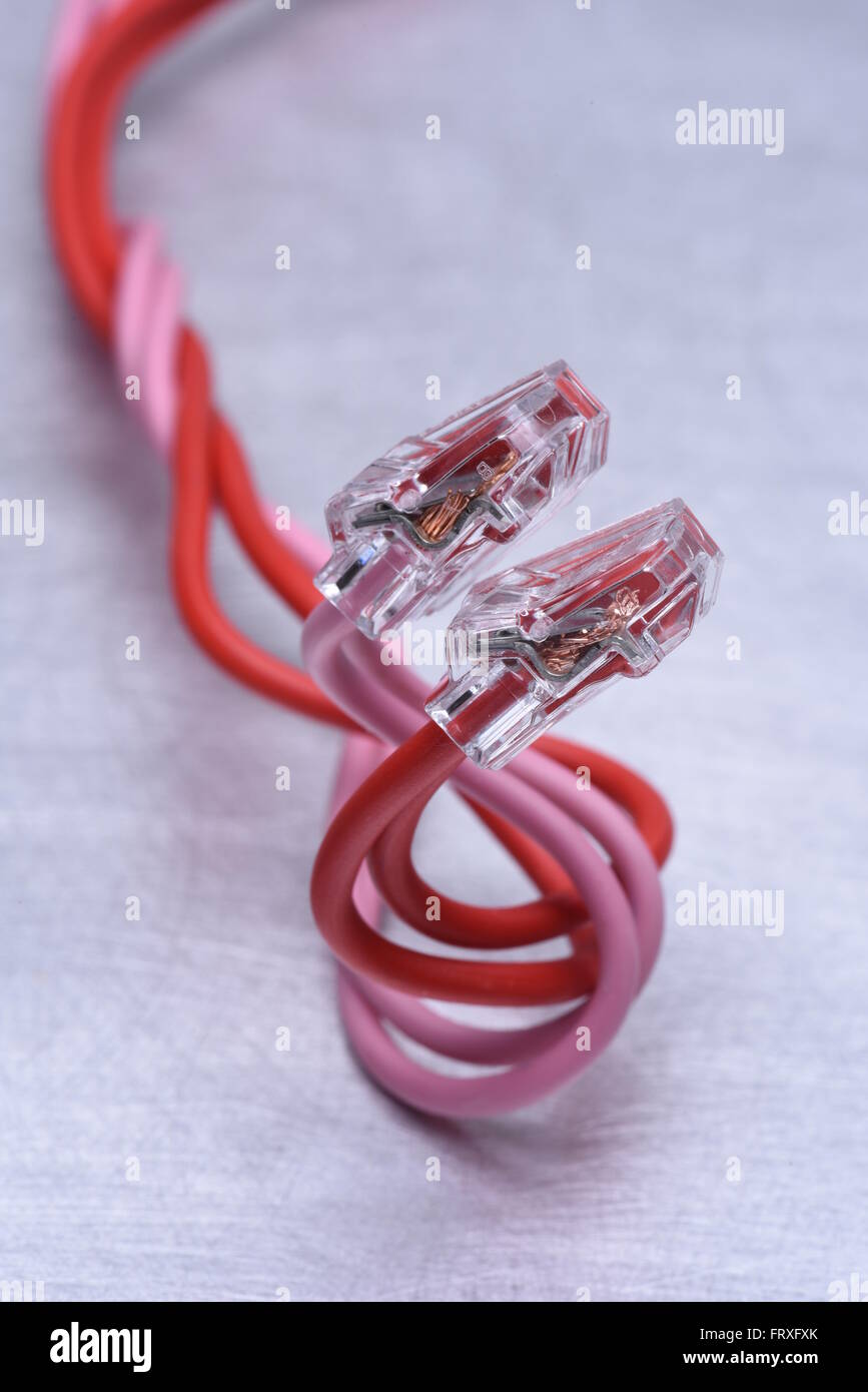 Closeup of a electric cables on metalic grey background Stock Photo - Alamy