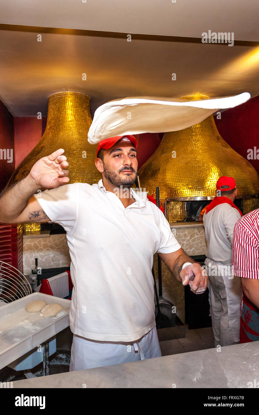 Man making pizza, Naples, Bay of Naples, Campania, Italy Stock Photo ...
