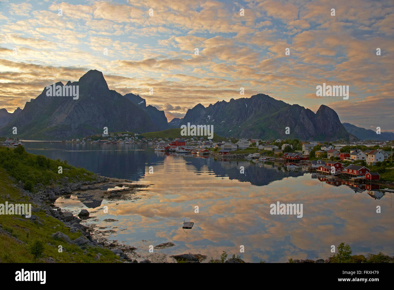 View of the fishing village of Reine in the evening light, Lofoten ...