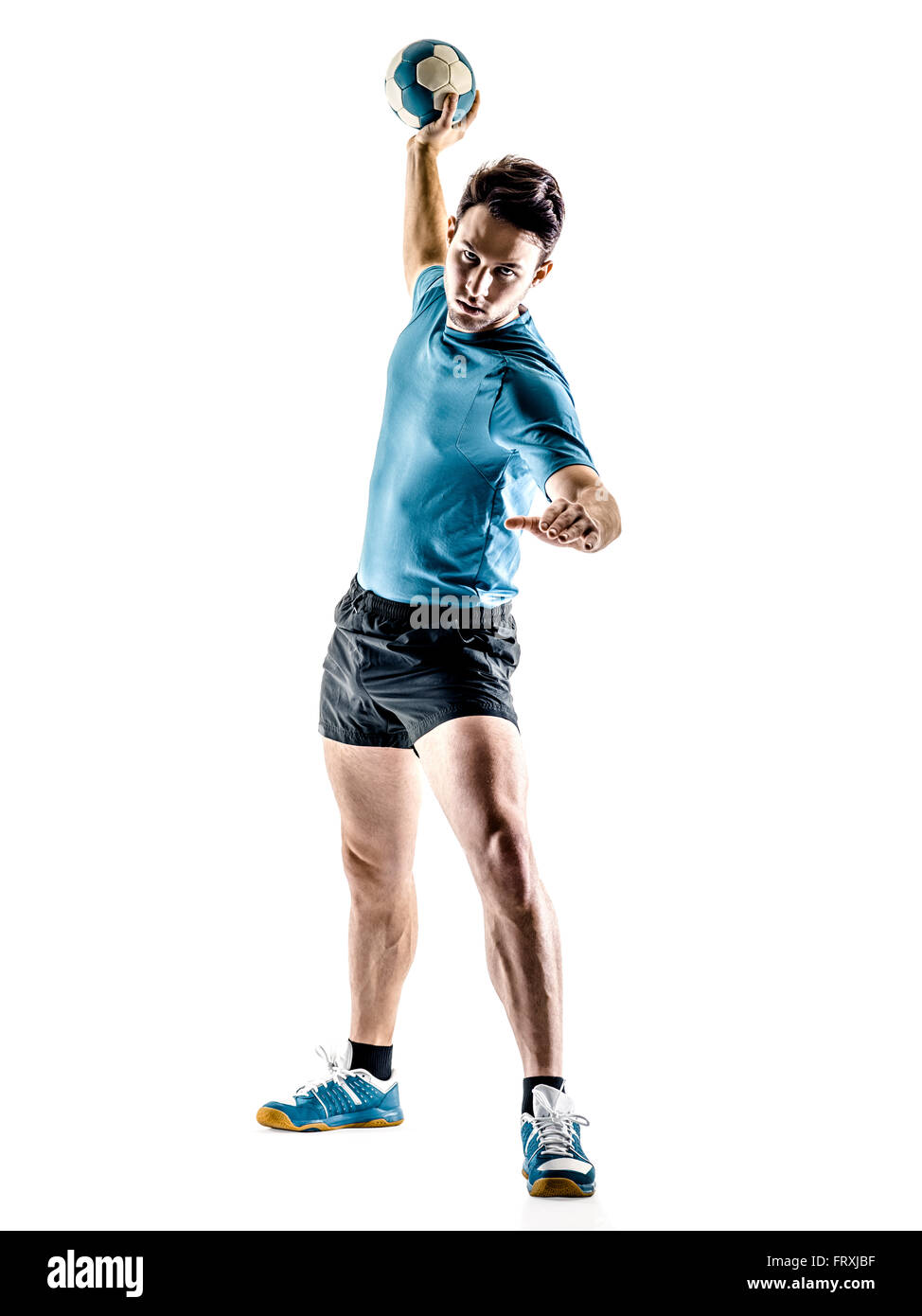 one young man handball player in studio on isolated white background ...