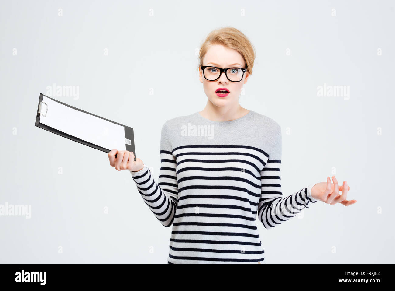 Woman shrugging isolated hi-res stock photography and images - Alamy