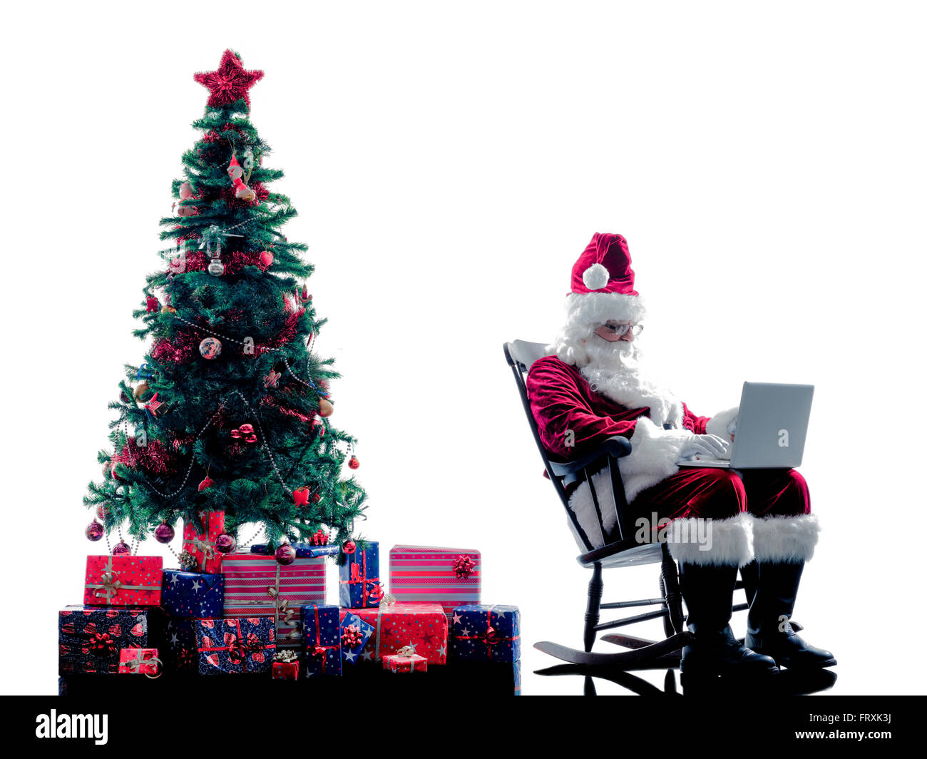 one santa claus man using laptop computer silhouette isolated on white ...