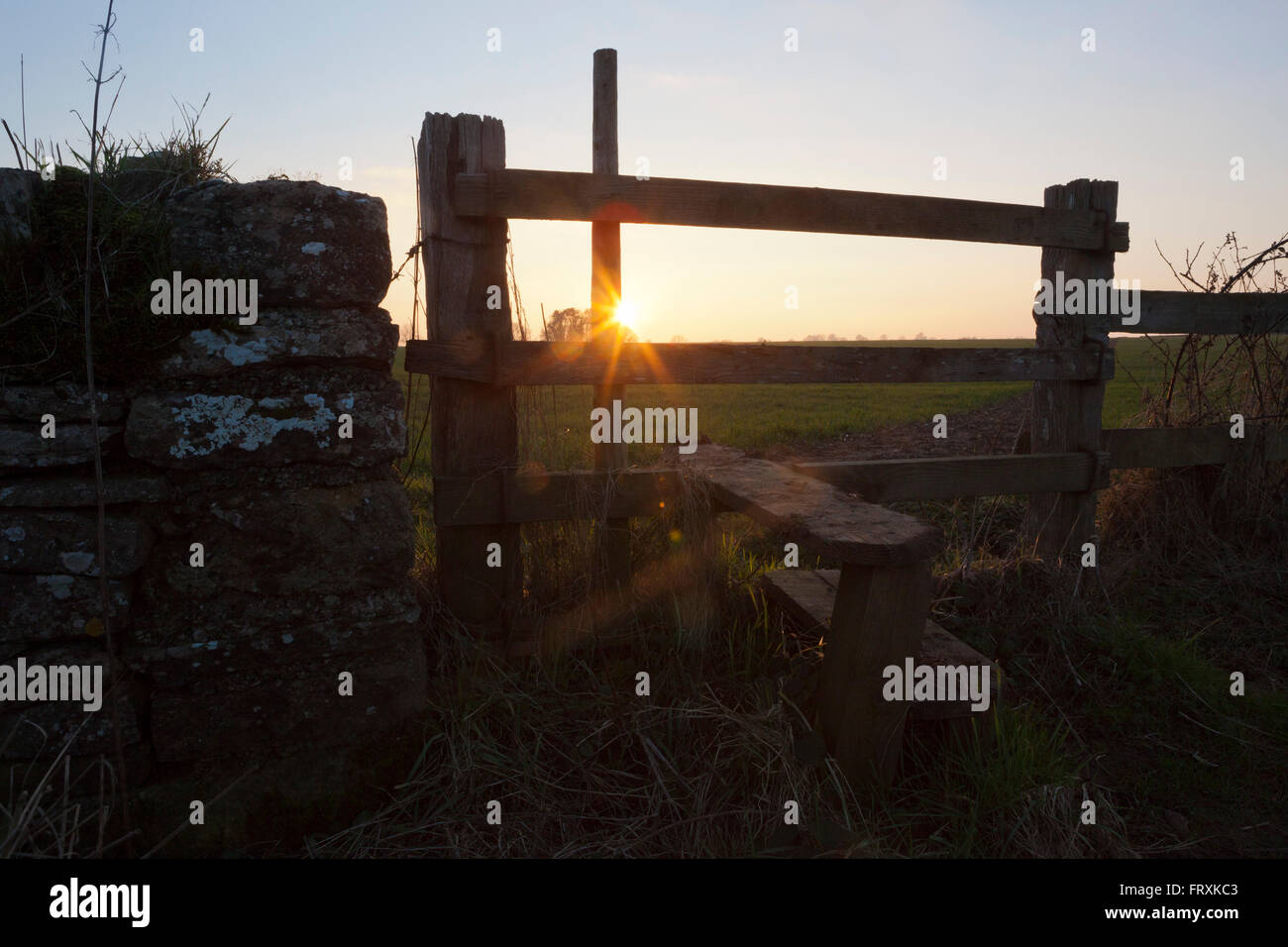 A country stile set into a dry stone wall in the Cotswolds, Uk ...