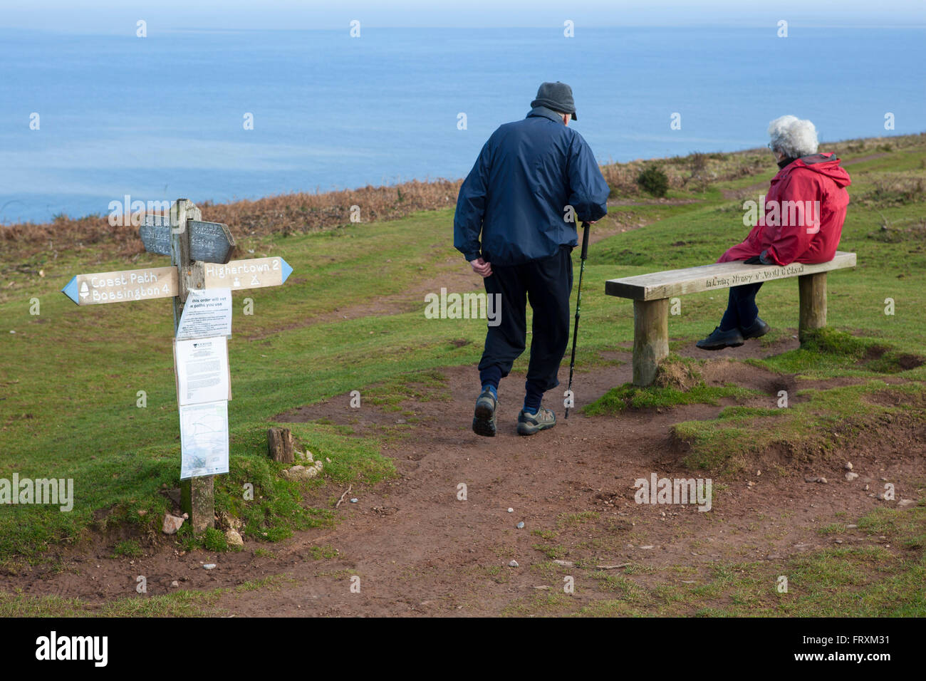 An old couple on part of the South West Coastal Path at Selworthy that ...