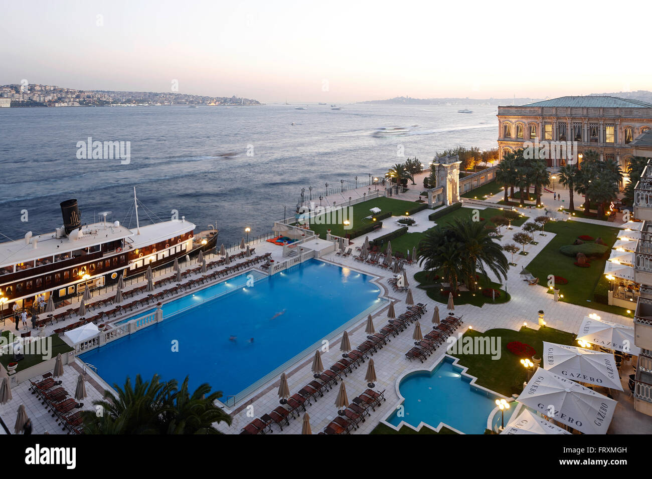 View over a hotel complex in the evening, Ciragan Palace, Istanbul ...