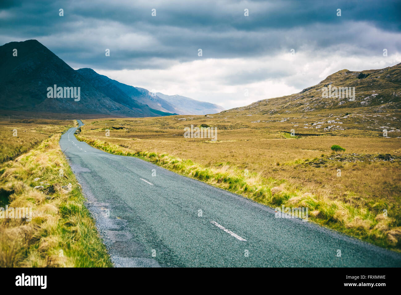 Ireland, Country road in Connemara Stock Photo - Alamy