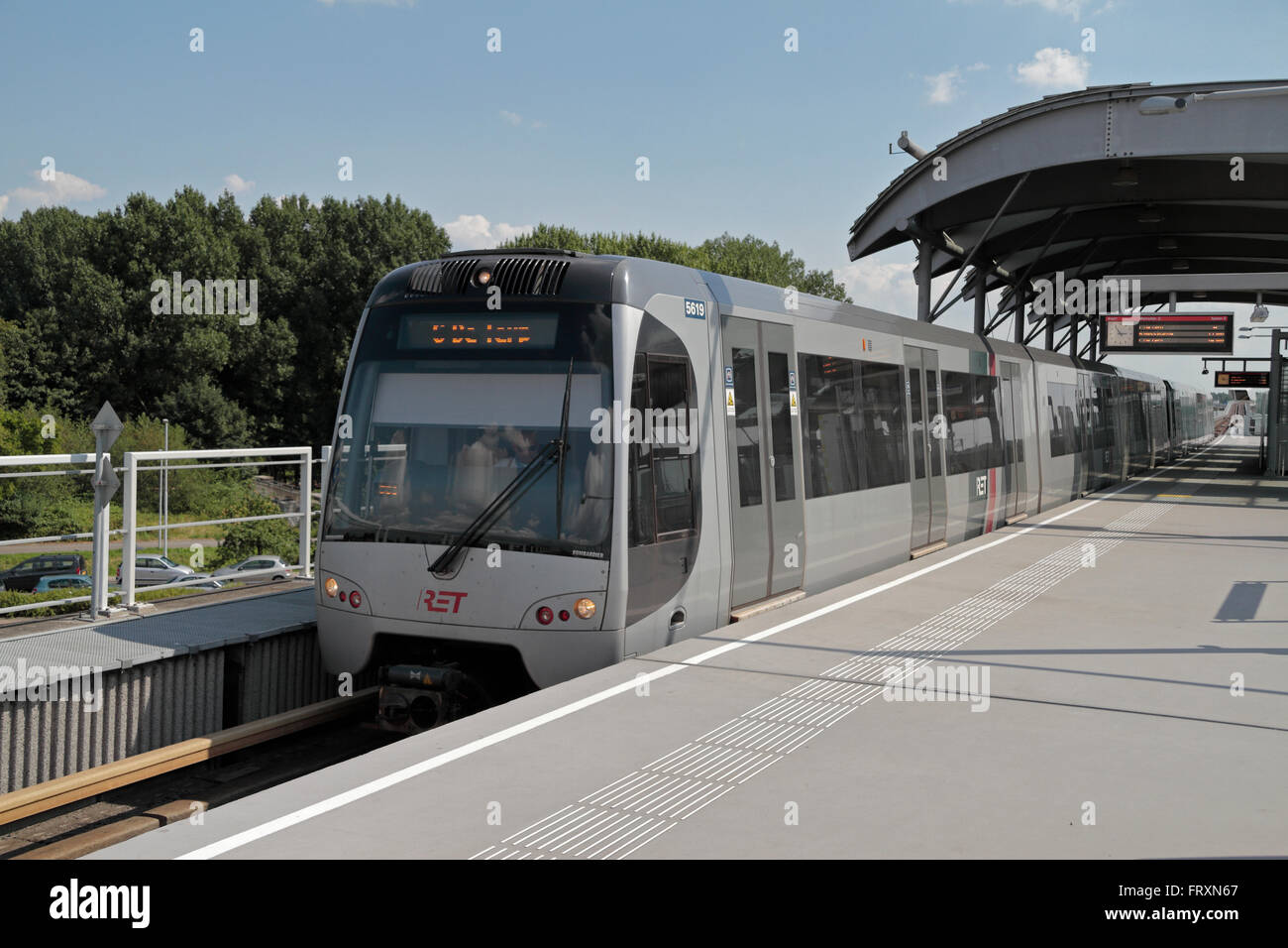 A Rotterdam Metro train pulling in to a station in Rotterdam ...