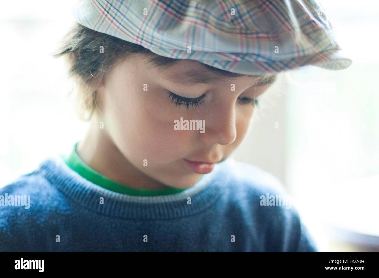Portrait of little boy wearing cap Stock Photo - Alamy