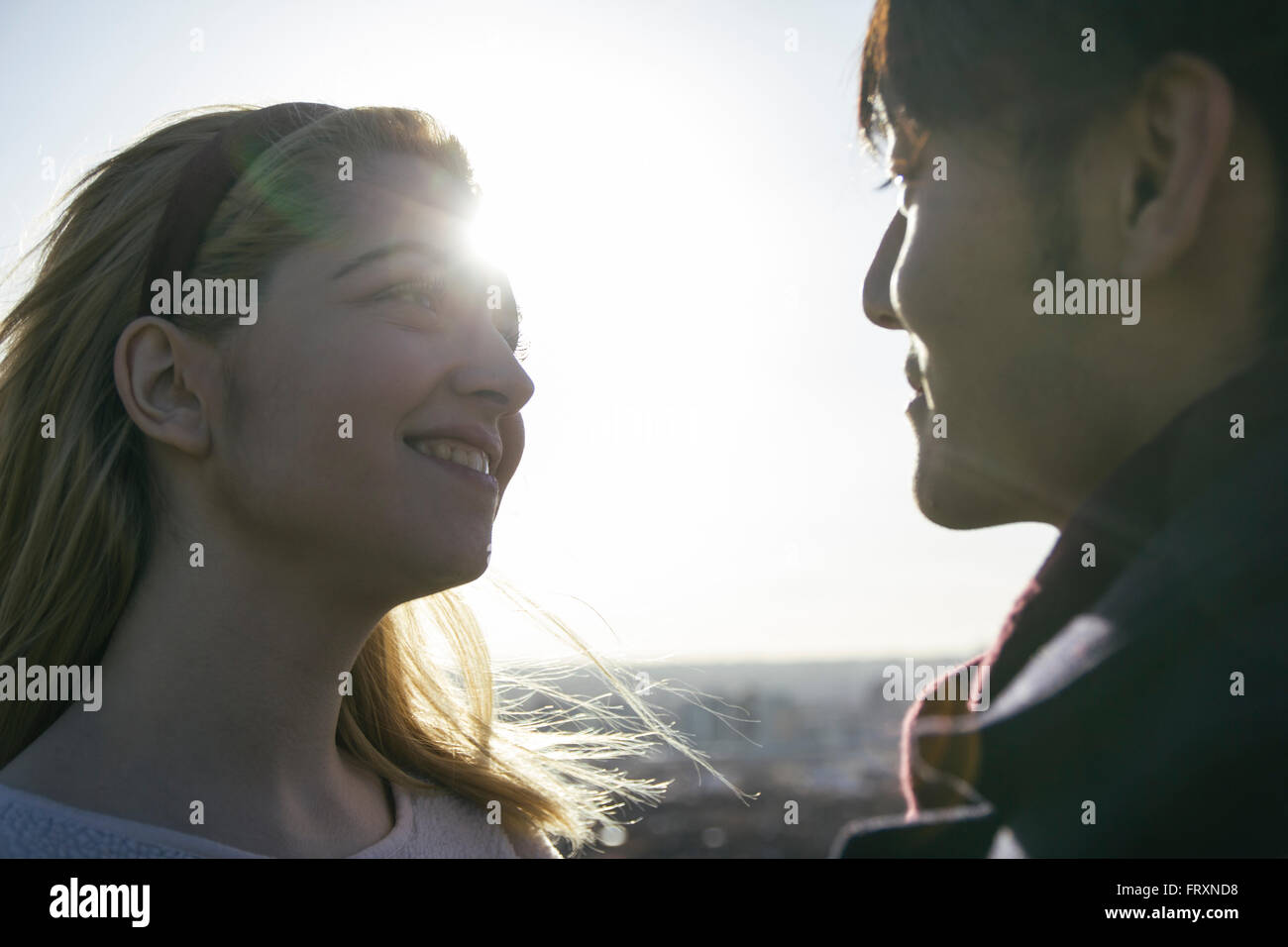 Young couple in love face to face Stock Photo - Alamy