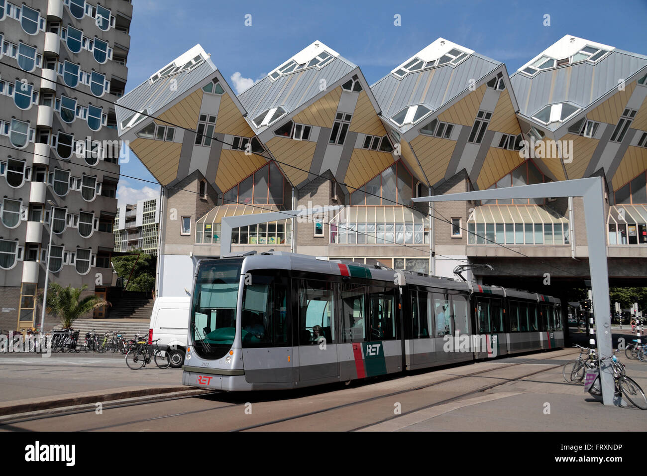 Tram passing under the Cube houses (Kubuswoningen) designed by Piet ...
