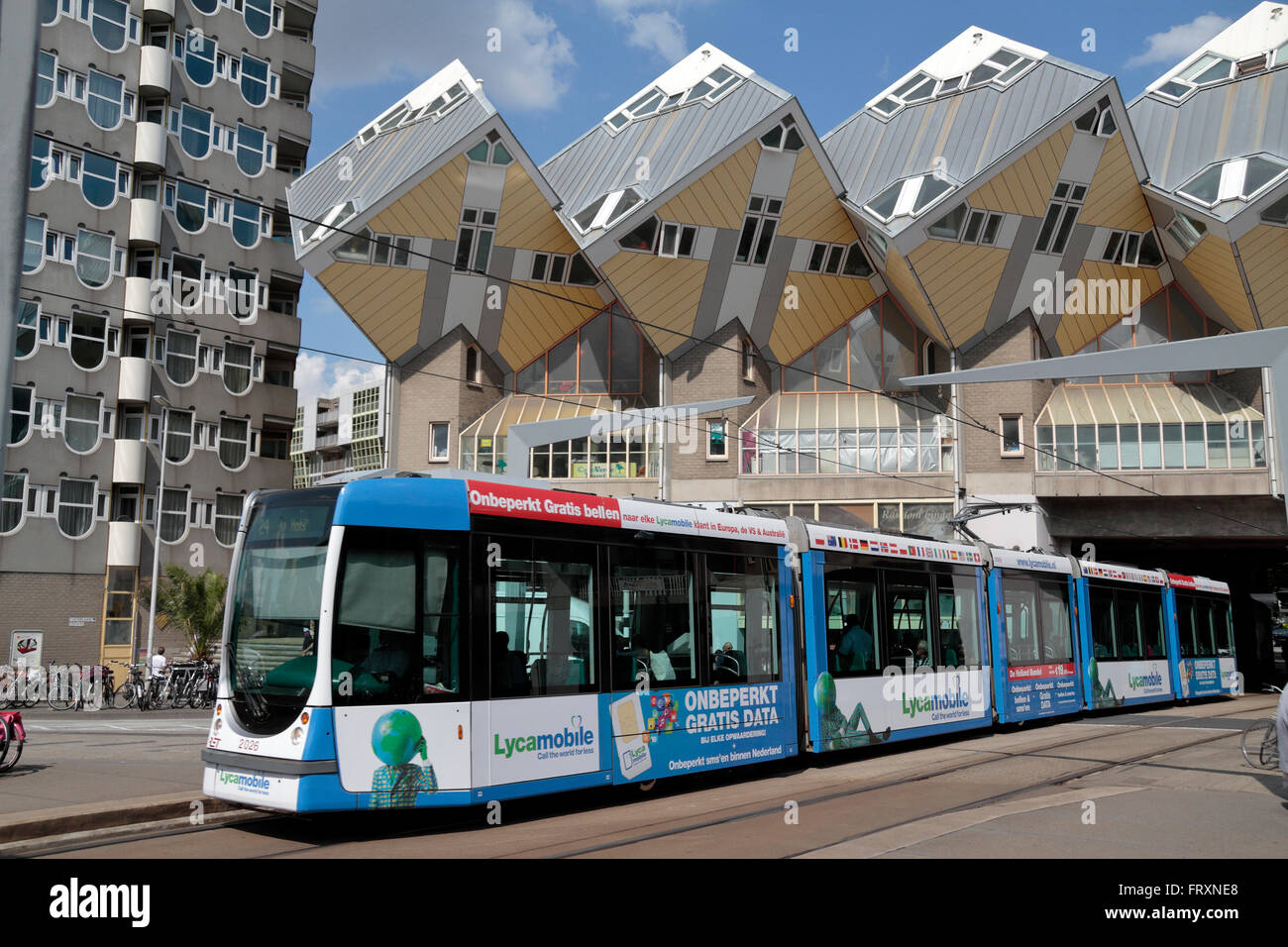Tram passing under the Cube houses (Kubuswoningen) designed by Piet ...