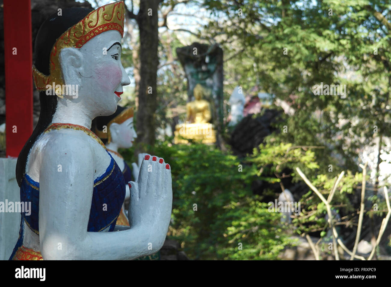 Statue on Mount Phou si in Luang Prabang - Laos Stock Photo - Alamy