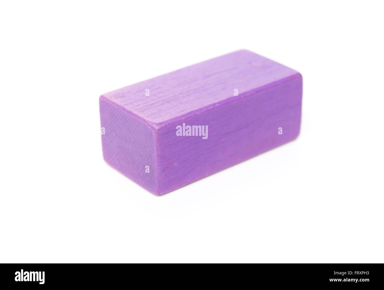 piece of purple wooden toy block on white background Stock Photo - Alamy