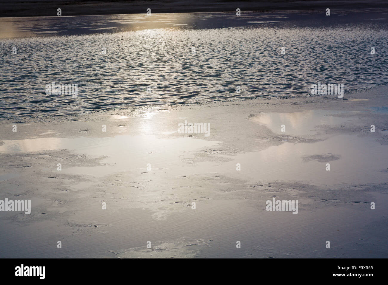 River covered with ice, Backlight, Thingvellir Nationalpark, Iceland ...