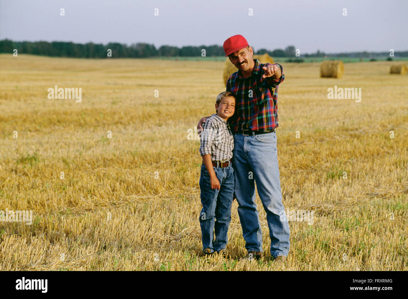Two farmers stand in field hi-res stock photography and images - Alamy
