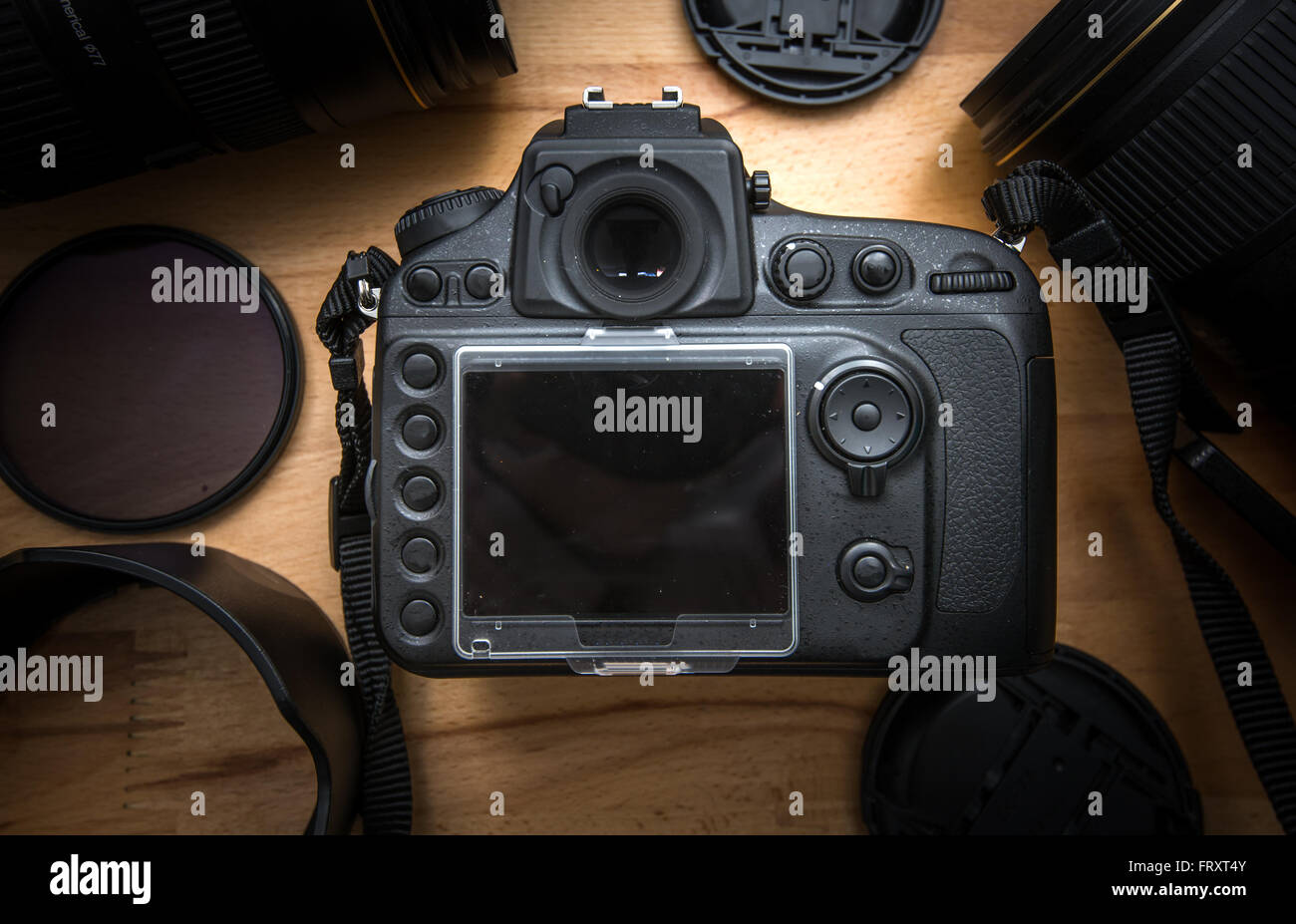 Close up modern DSLR camera and devices Stock Photo - Alamy