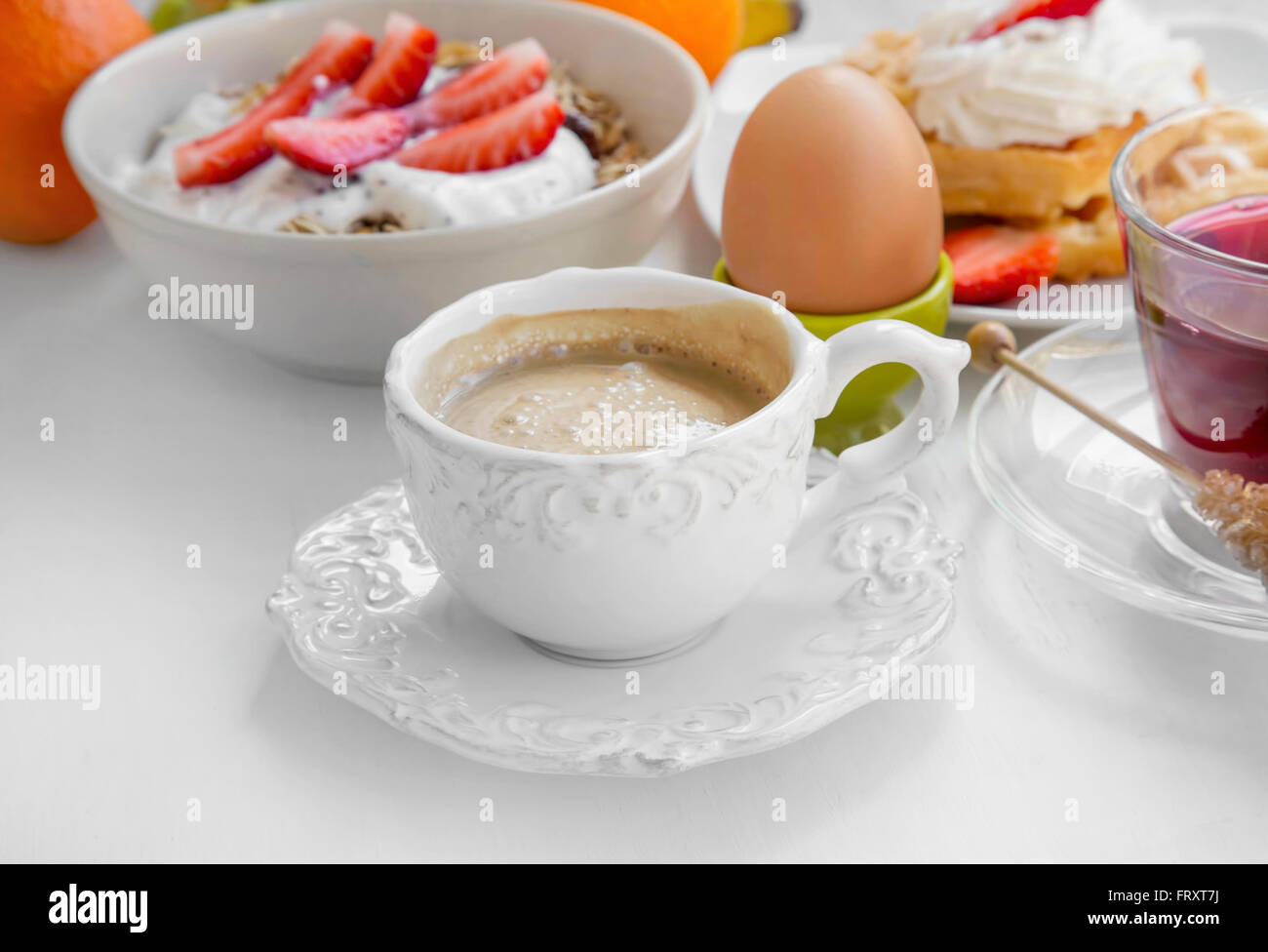 Morning coffee cup with breakfast egg,muesli bowl and fruits meal Stock ...