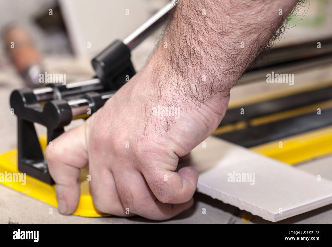 Cutting ceramic tile hi-res stock photography and images - Alamy