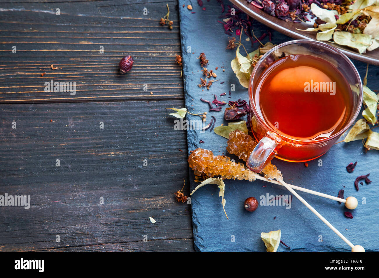 Red tea with hibiscus and rosehip, brown sugar rock candies and dried ...